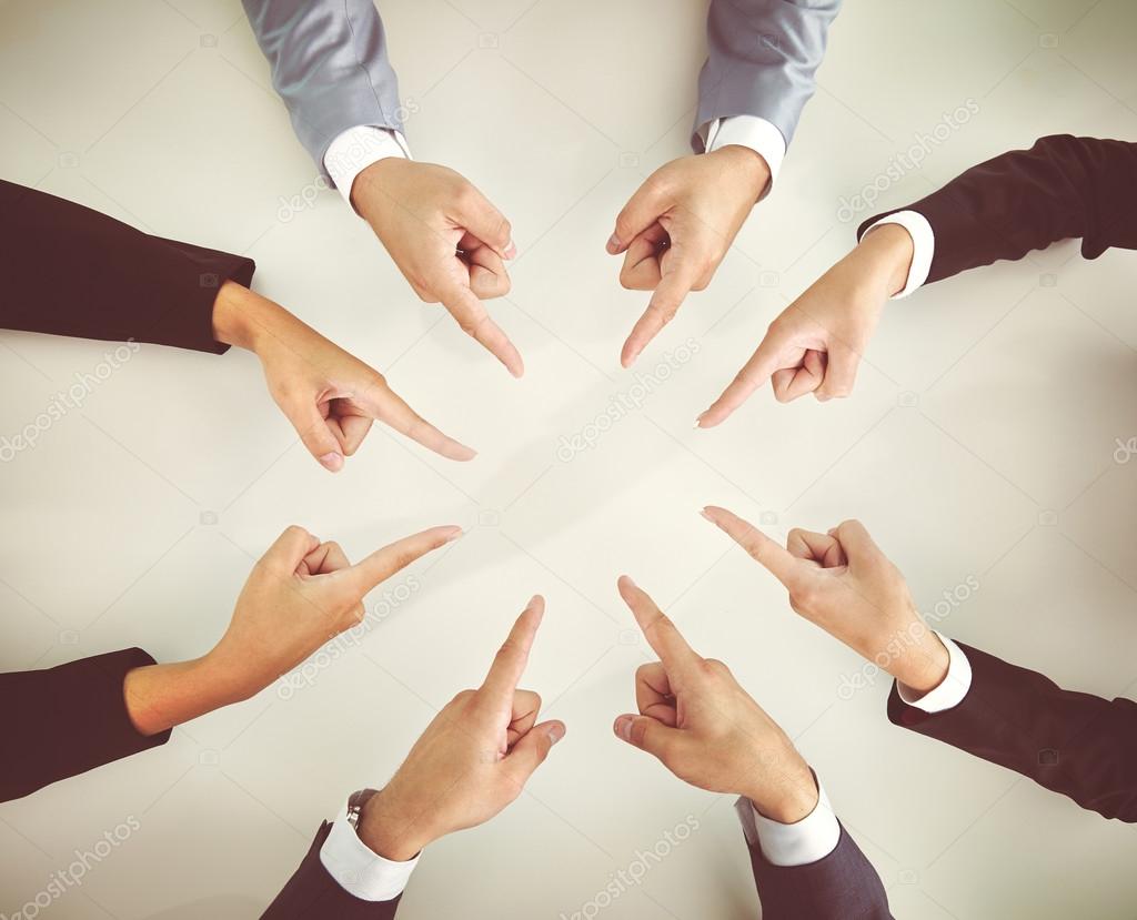 People Pointing At Each Other