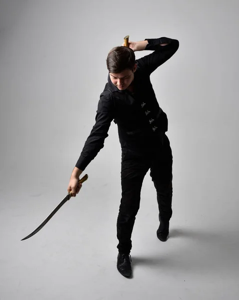 Man dragging sword Stock Photos, Royalty Free Man dragging sword Images ...