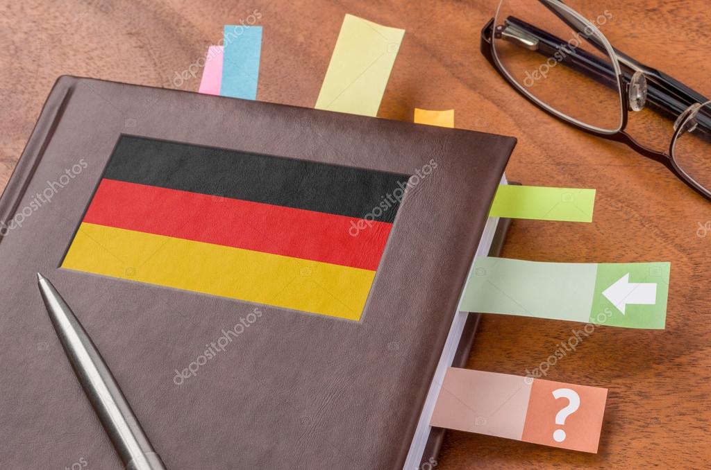 Notebook with the flag of Germany — Stock Photo © Zerbor #65964873