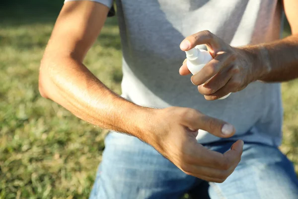 Man Applying Insect Repellent Hand Outdoors Closeup Stock Photo by ...