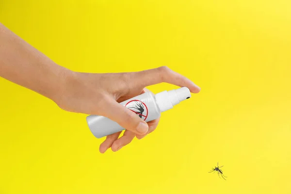 Spraying bug spray on skin Stock Photos, Royalty Free Spraying bug ...