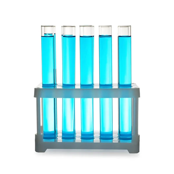 Test tubes with blue liquid on white background. Laboratory glassware ...