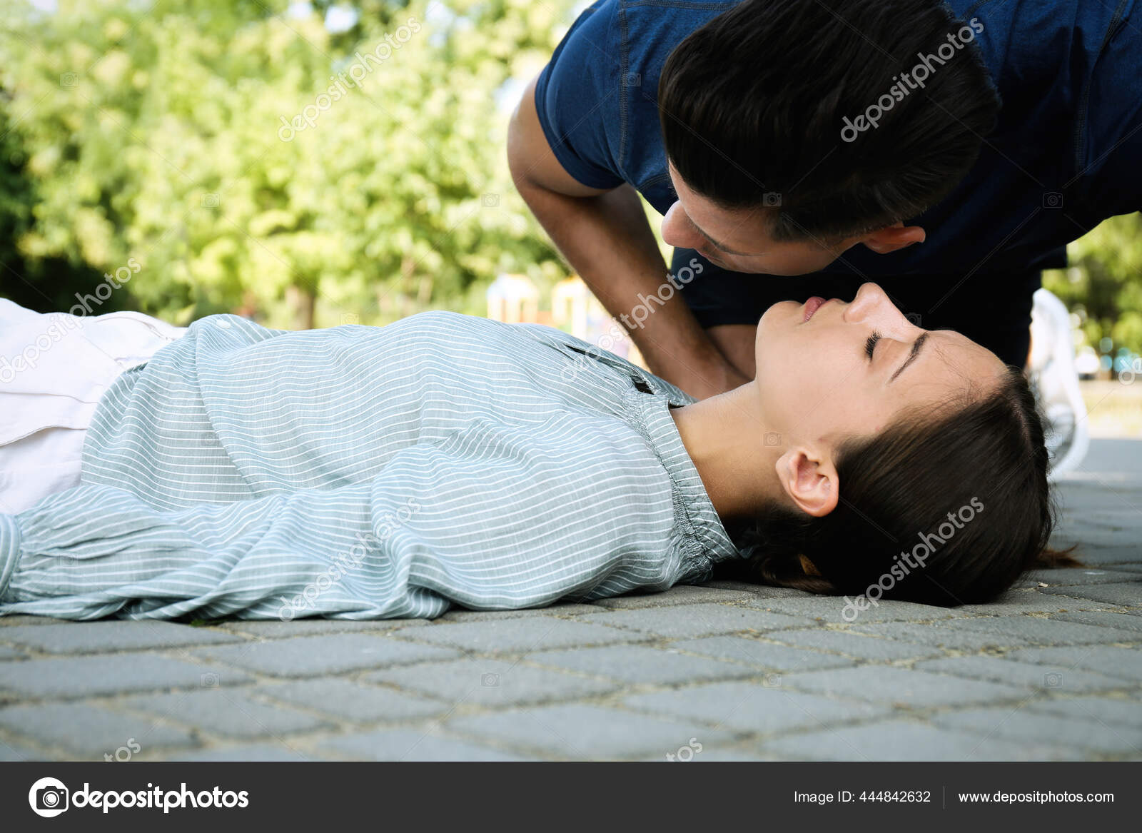 Man Checking Breathing Unconscious Young Woman Outdoors — Stock Photo ...