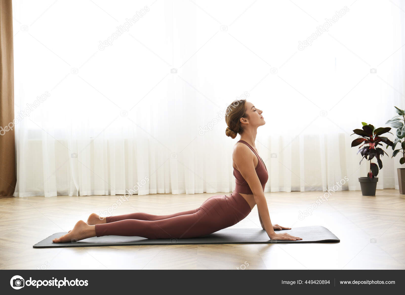 Young Woman Practicing High Cobra Asana Yoga Studio Bhujangasana Pose ...