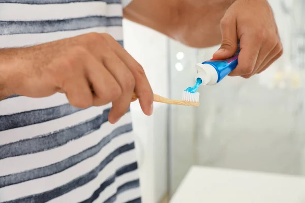 Man Applying Toothpaste Brush Bathroom Closeup Stock Photo by ...