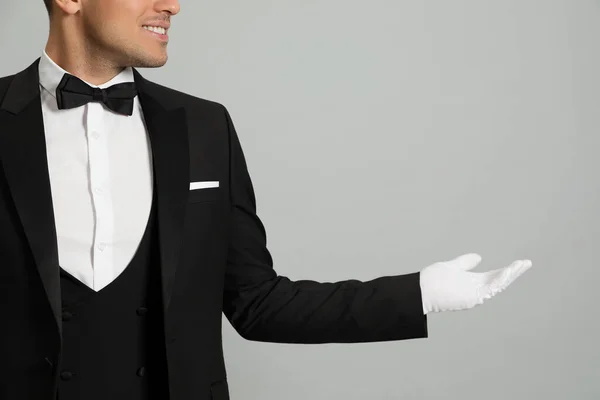 Handsome Butler Tray Light Grey Background Stock Photo by ©NewAfrica ...