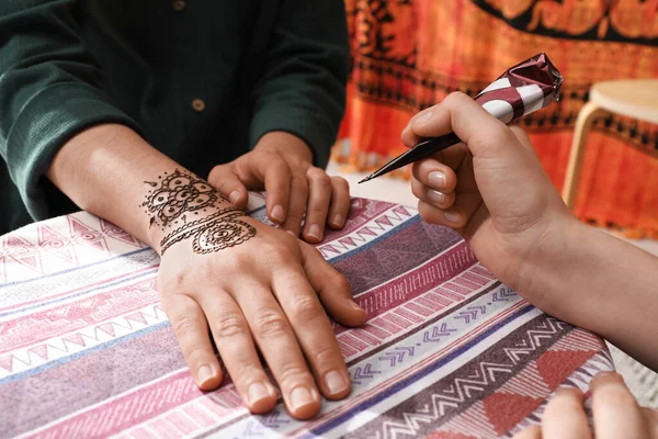 Henna application process Stock Photos, Royalty Free Henna application ...