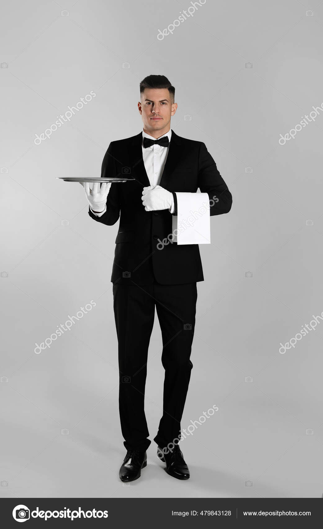 Handsome Butler Tray Light Grey Background Stock Photo by ©NewAfrica ...