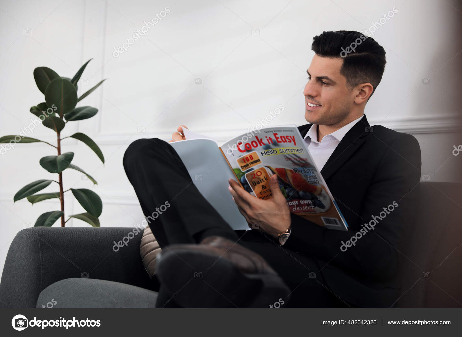 Person Reading Magazine