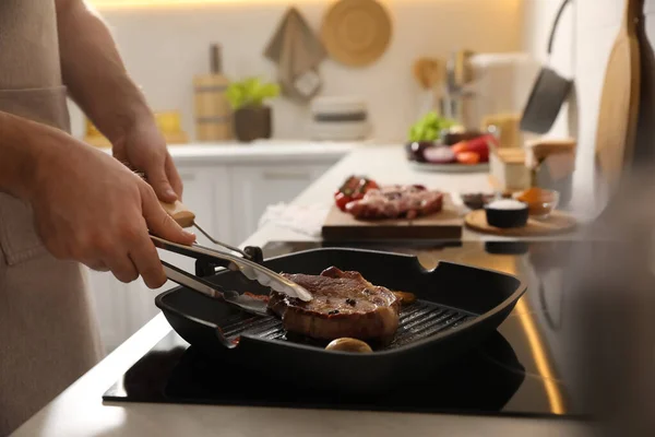 Man cooking steak Stock Photos, Royalty Free Man cooking steak Images ...