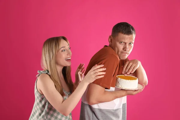 Greedy Man Hiding Tasty Cake Woman Pink Background Stock Photo by ...