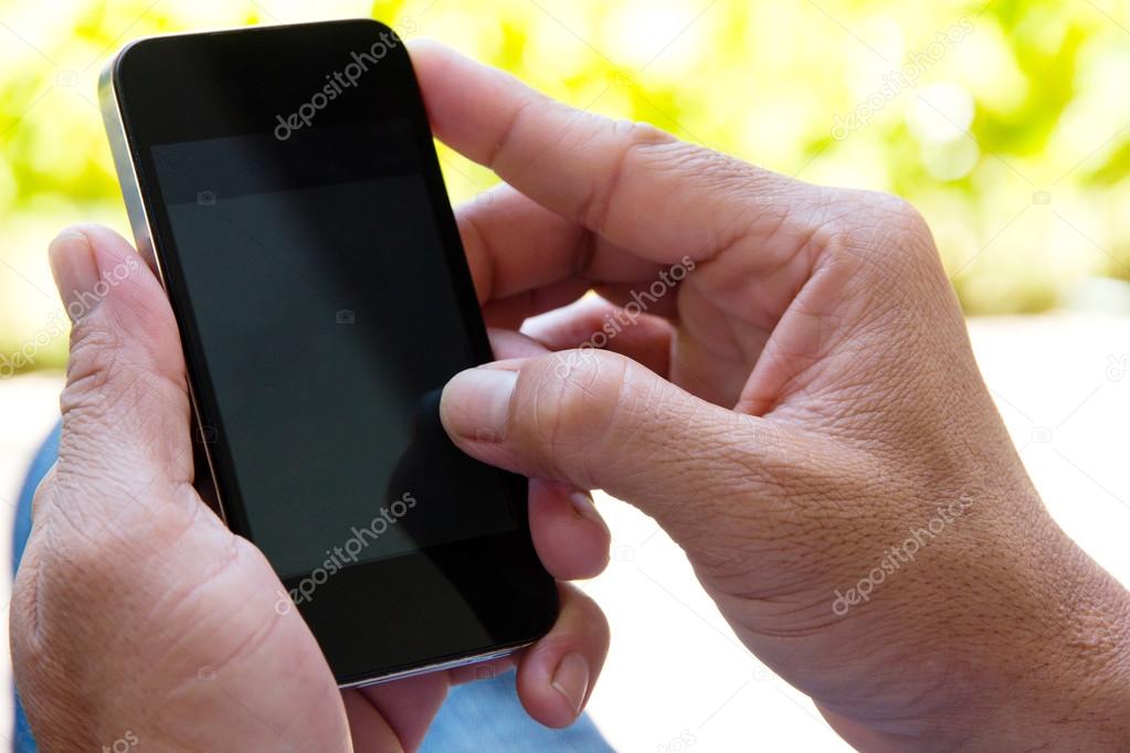 Man checking his phone background Stock Photo by ©ponsulak 72577277