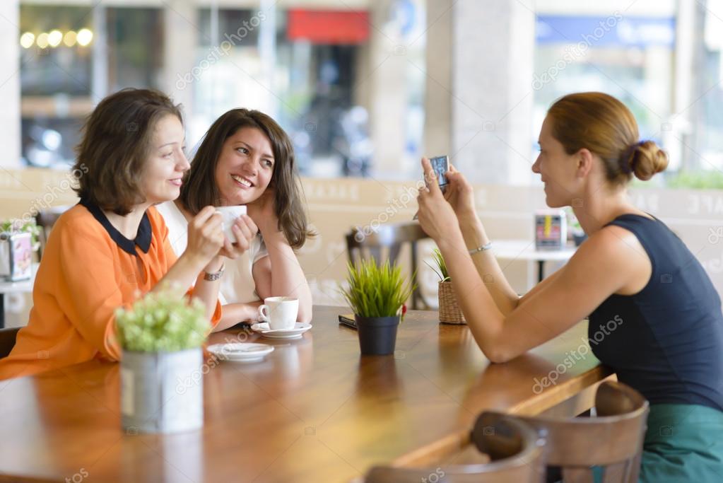 Women Having Fun in Restaurant — Stock Photo © oneblink #92384198