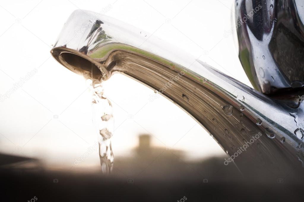 Open outdoor faucet — Stock Photo © CoffeeMate #77961460