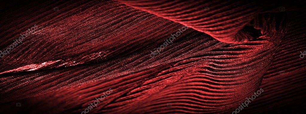 Crepé de color rojo profundo, es un tejido de seda, lana o fibras ...
