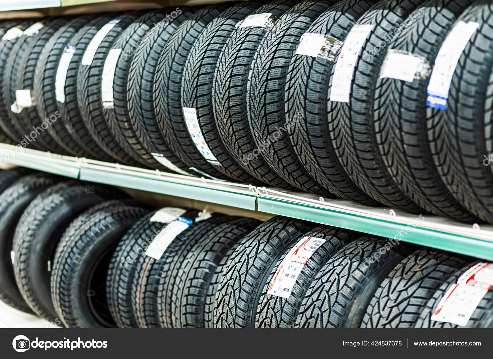 Car New Tires Stacked Rows Store — Stock Photo © Steklo_KRD #424837378