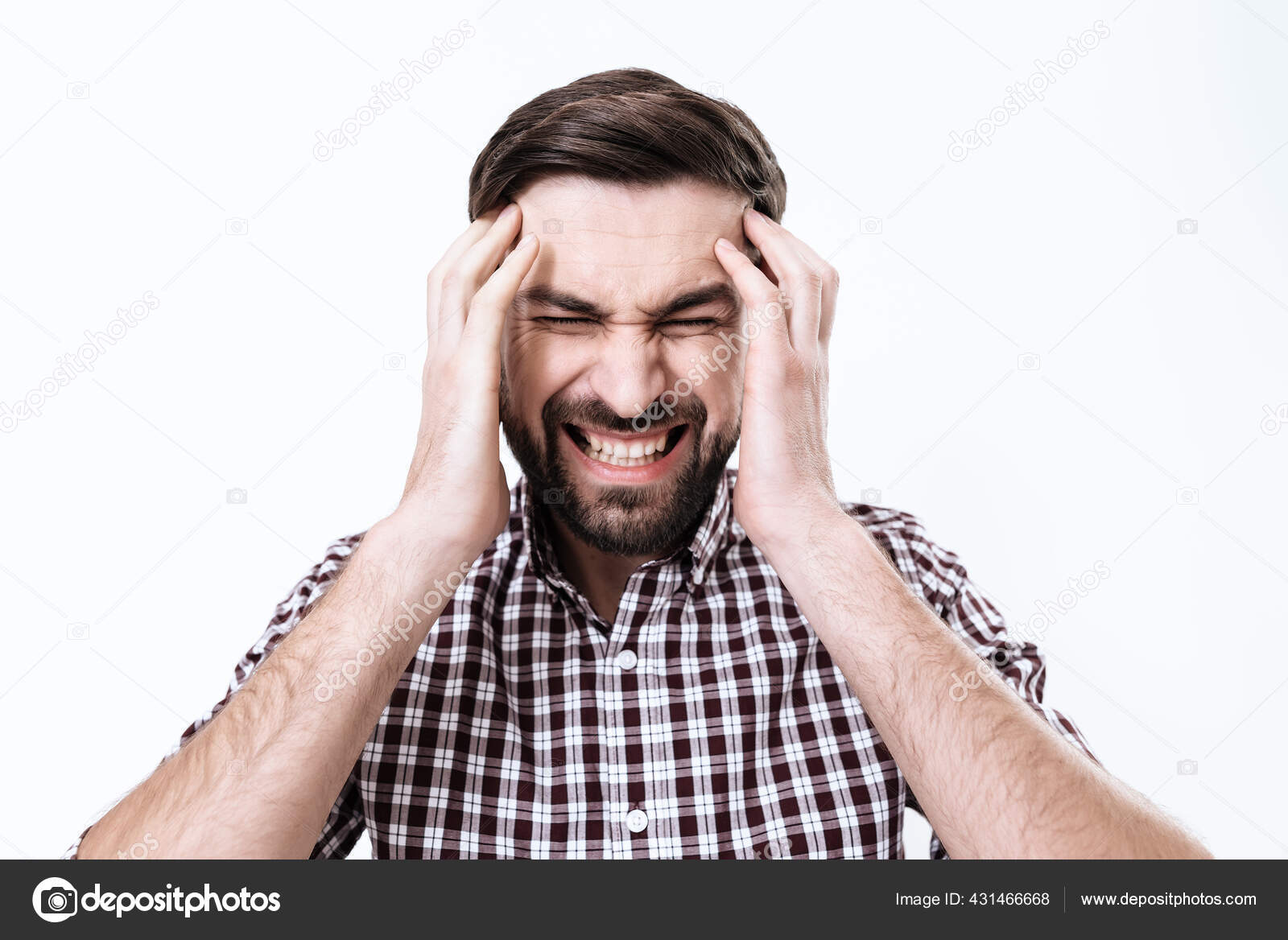 A man twists his face and feel pain. Stock Photo by ©Freeograph 431466668