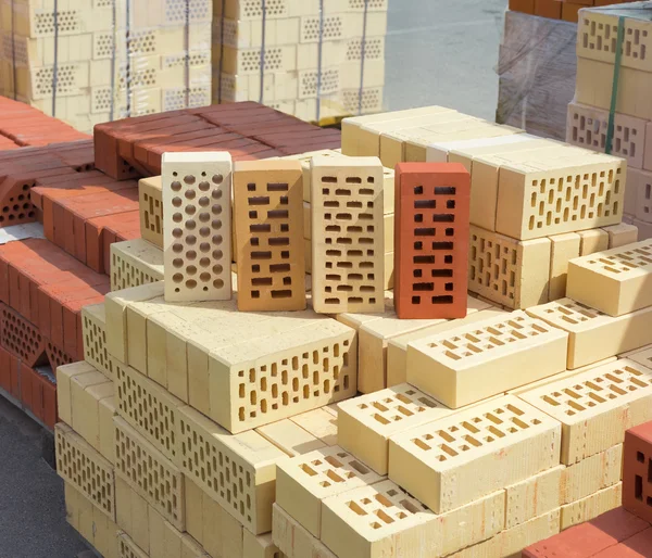 Perforated bricks of different colors with rectangular holes — Stock ...