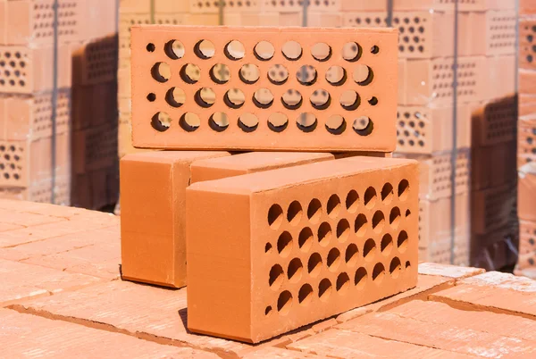 Perforated bricks of different colors with rectangular holes — Stock ...