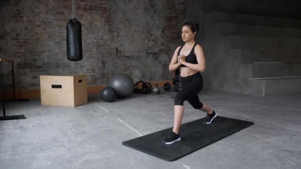 Young Indian Woman Black Top Leggings Doing Leg Stretches Doing — Stock ...