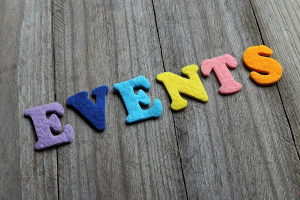 Word events on colorful wooden cubes — Stock Photo © chrupka #76549817