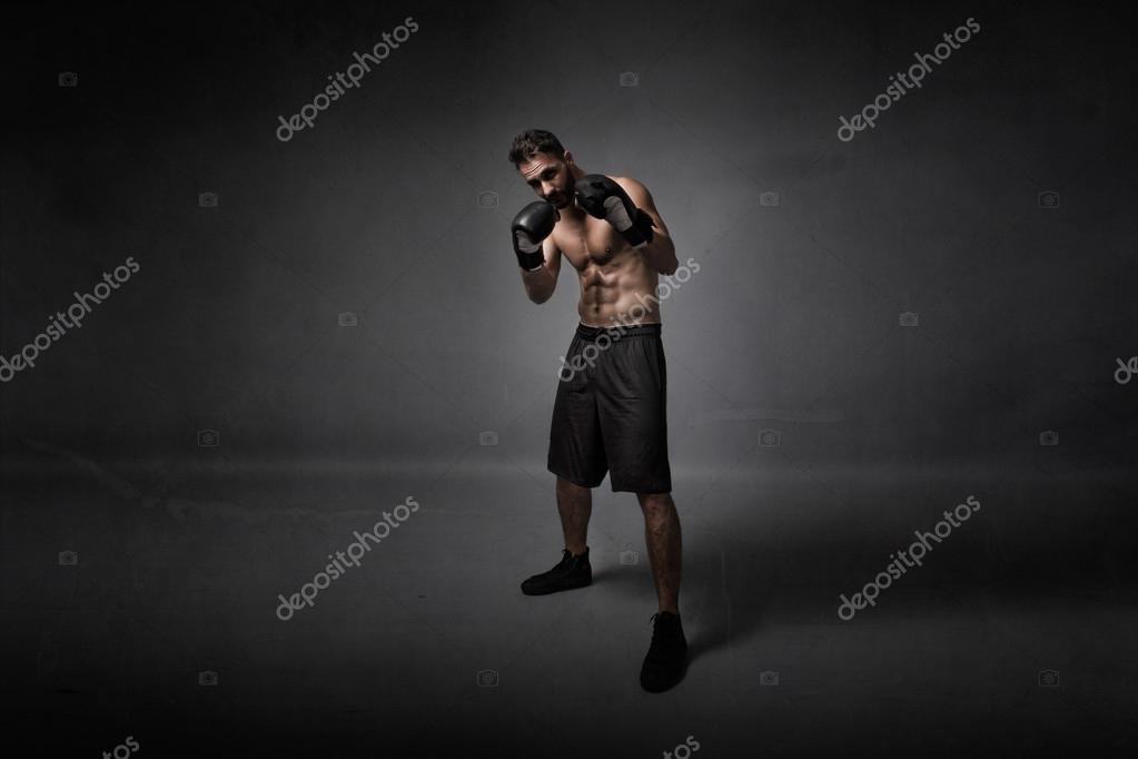 Boxer in defensive position — Stock Photo © marcogarrincha #112577364