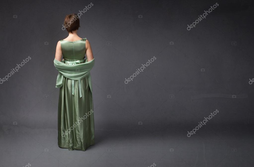 Elegant woman back side Stock Photo by ©marcogarrincha 78274640