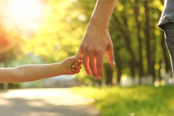 Father holding hands Stock Photos, Royalty Free Father holding hands ...