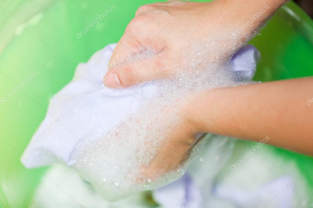 Hand washing in plastic bowl Stock Photo by ©kdshutterman 63121483
