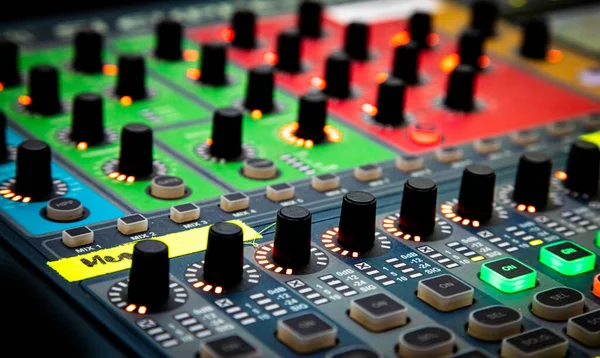 Close up of Sliders and buttons on Audio Mixing Desk at live event ...