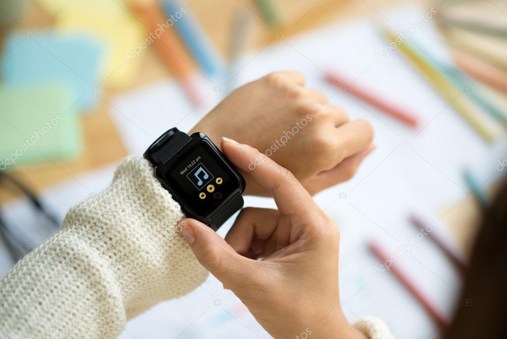 Person osing smart watch — Stock Photo © DragonImages #105007602