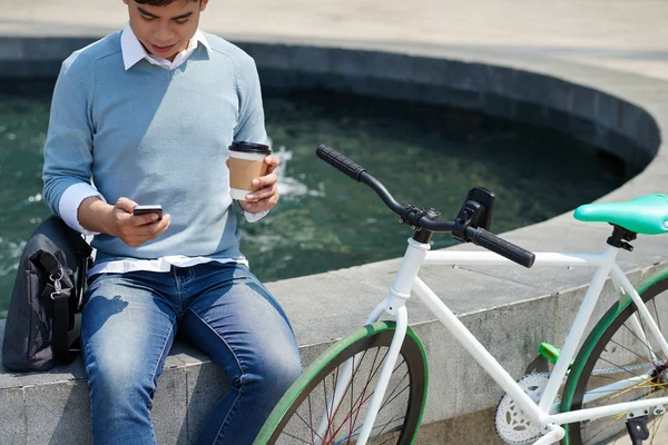 Guy using application on phone - Stock Image - Everypixel