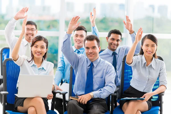 People raising hands Stock Photos, Royalty Free People raising hands ...