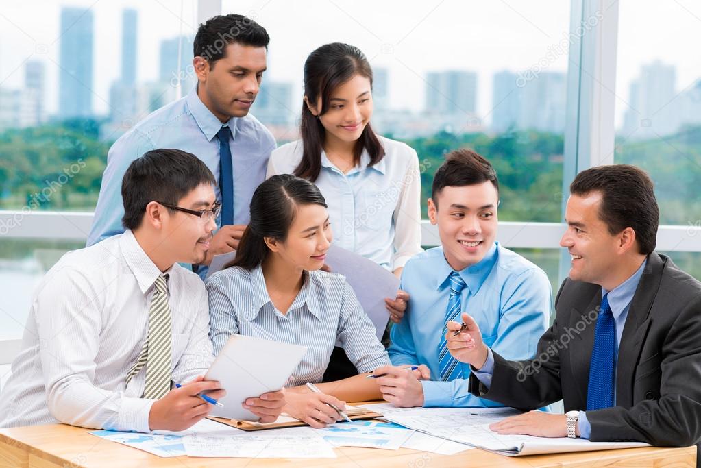 Business team discussing new project — Stock Photo © DragonImages #54316305