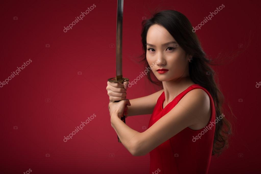 Chinese woman with a sword Stock Photo by ©DragonImages 69312457