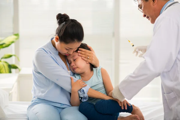 Scared child injection Stock Photos & Royalty-Free Images | Depositphotos