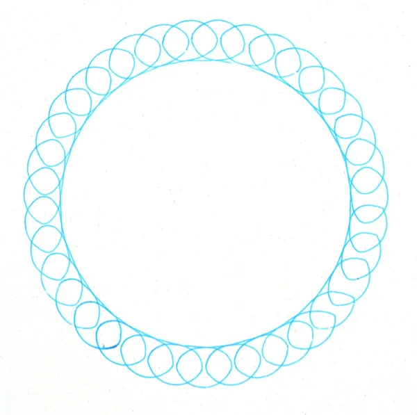 Drawing spirograph on white paper — Stock Photo © kampee_p #54646391