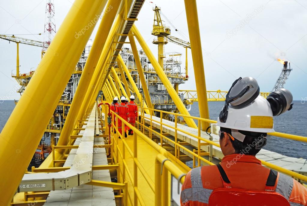 Oil worker and oil rig ⬇ Stock Photo, Image by © kampee_p #73852363