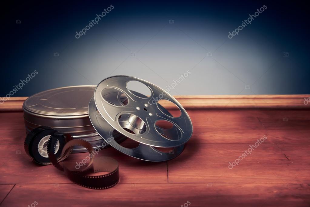 Filmmaking scene with dramatic lighting, movie reel — Stock Photo ...