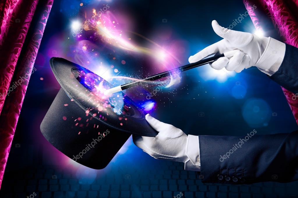 Magician hands with magic wand — Stock Photo © fergregory #82284458
