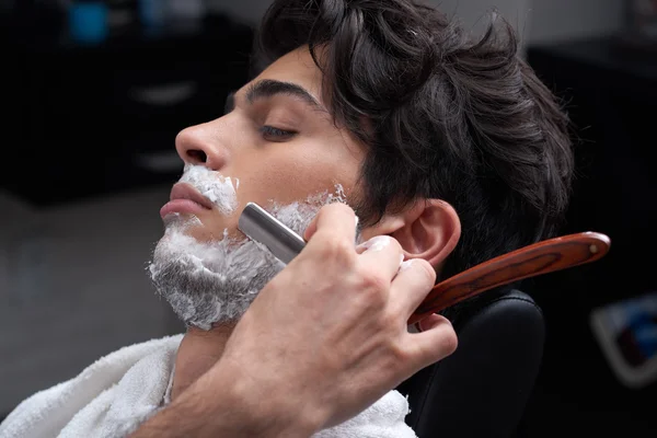 Shaving process Barbershop face closeup - Stock Image - Everypixel