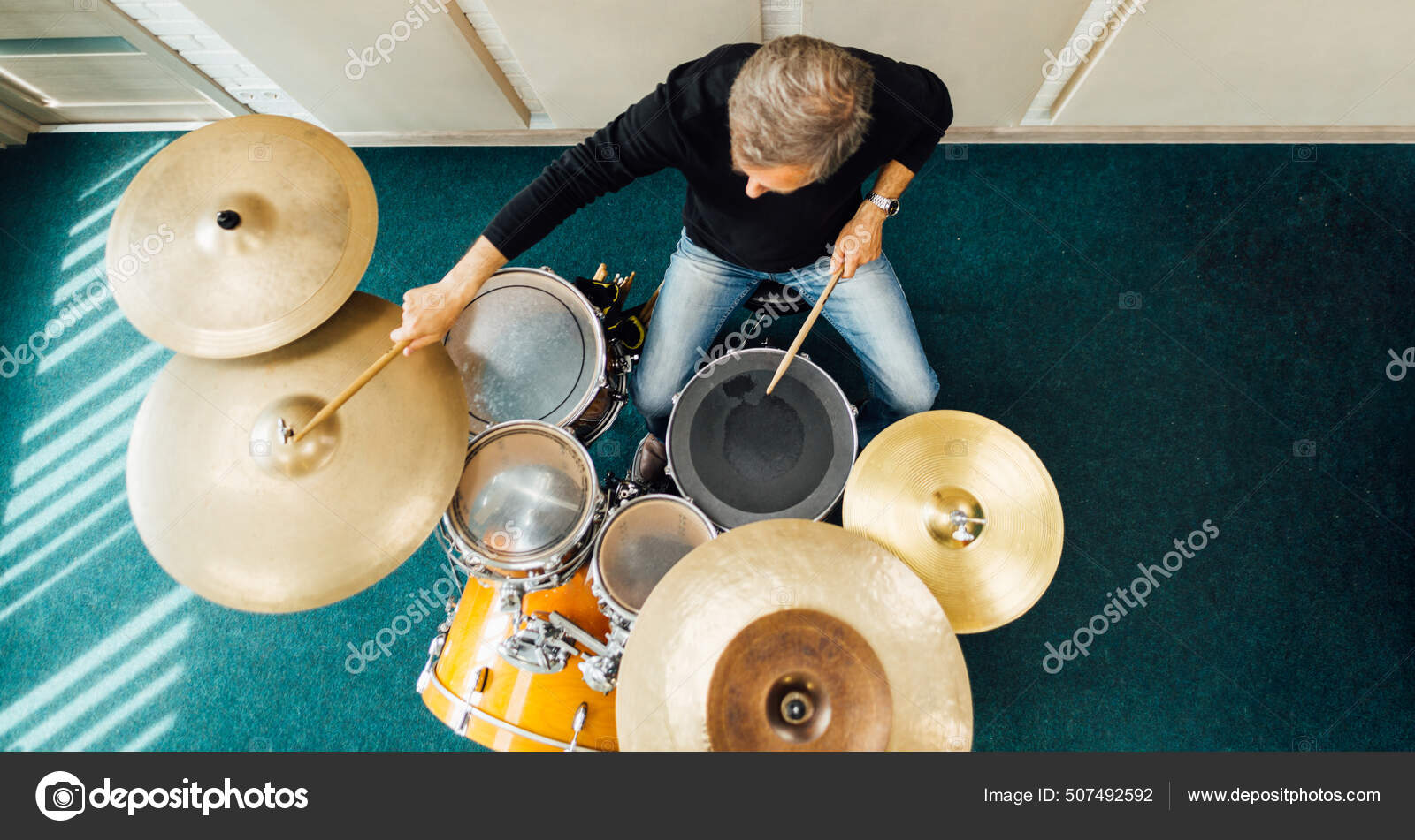 Top view man playing drum kit. Stock Photo by ©Artranq 507492592