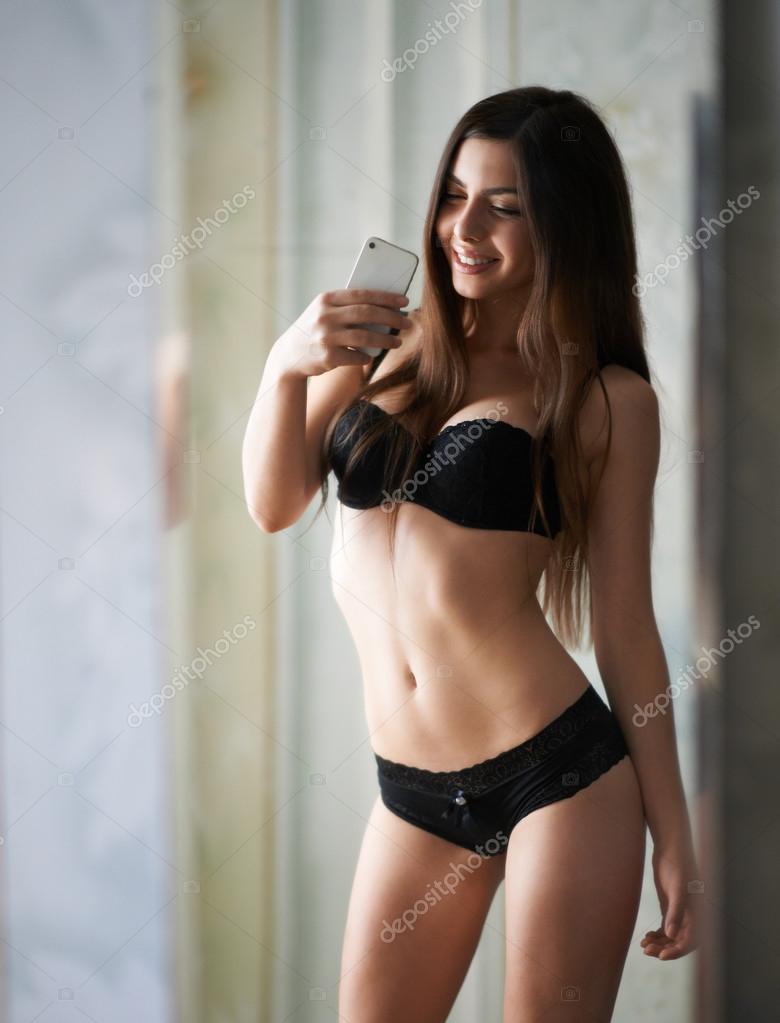 Mädchen In Dessous Macht Ein Foto Von Sich Stockfotografie