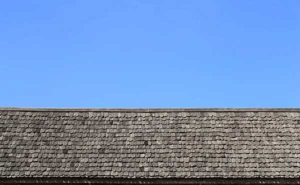 The Bark tiles of roof on blue sky background Stock Photo by ...