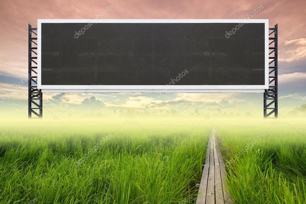 Empty large sign with wood bridge between rice field — Stock Photo ...