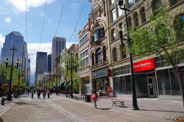 CALGARY, CANADA - MAY 26: Tourists stroll along historic Stephen Avenue ...