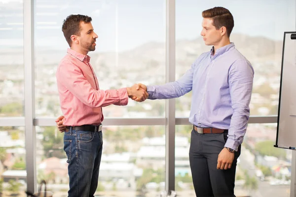man giving a handshake - Stock Image - Everypixel