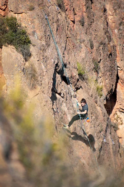One sportswoman mountain climbing. Physical activity in the countryside ...