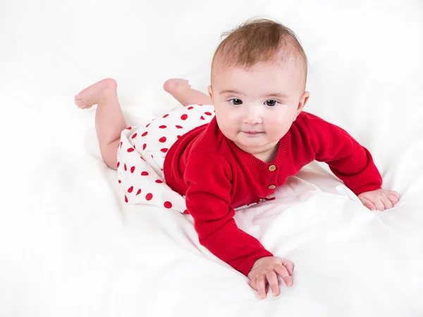 The child in bright clothes Stock Photo by ©seqoya 110379304