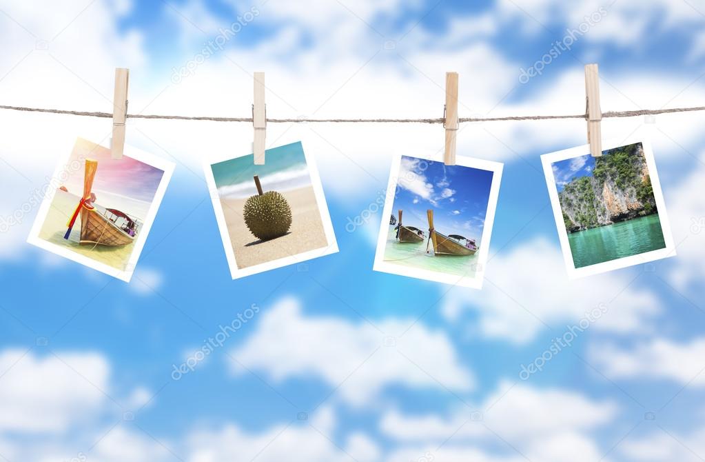 Vacation photos hanging on a rope — Stock Photo © merrydolla #97729674